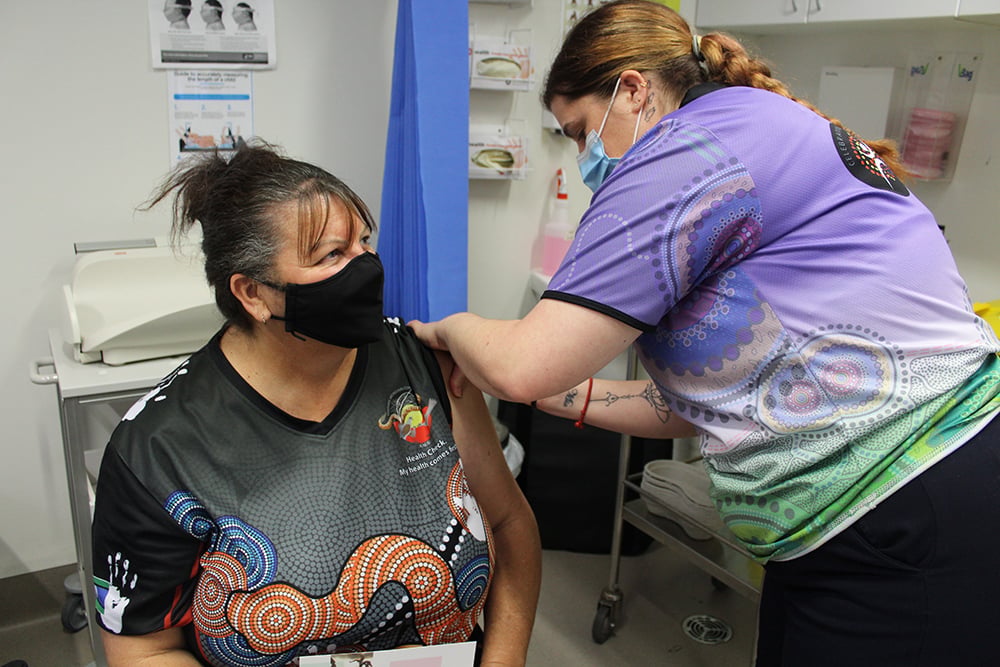 Patients roll up sleeves for pneumococcal vaccination at Tharawal AMS ...
